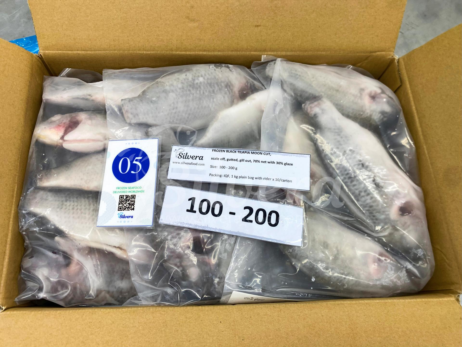 Whole cleaned moon-cut black tilapia ready for delivery