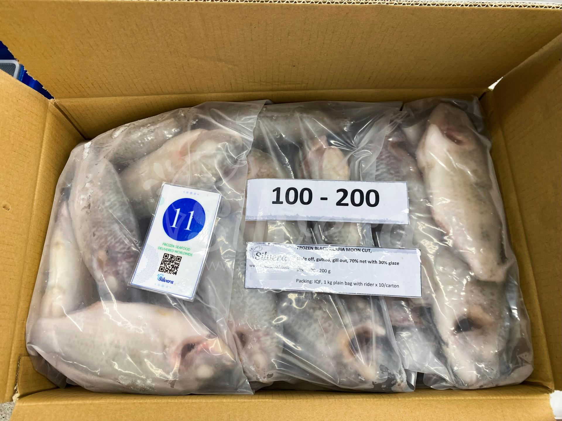 Whole cleaned moon-cut black tilapia ready for delivery